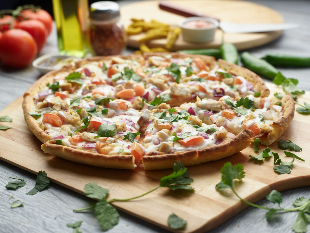 Get BBQ Chicken Pizza Near Me Loaded with Tasty Toppings